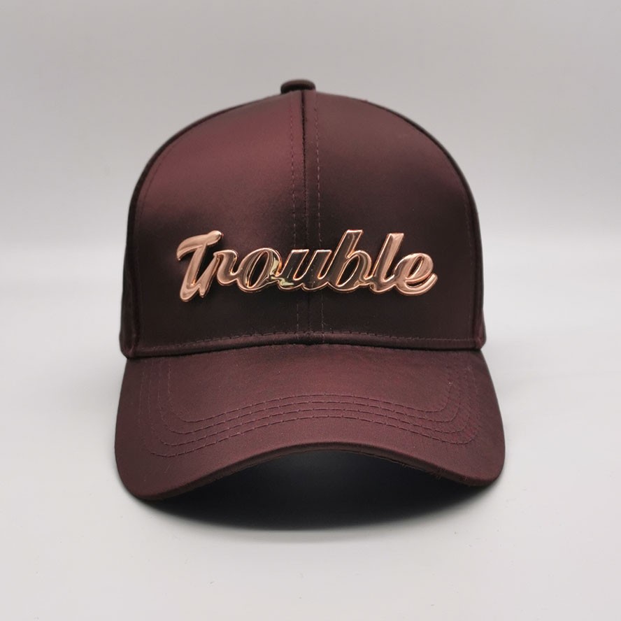 Trouble metaled label burgundy satin cap ladies fashion hat